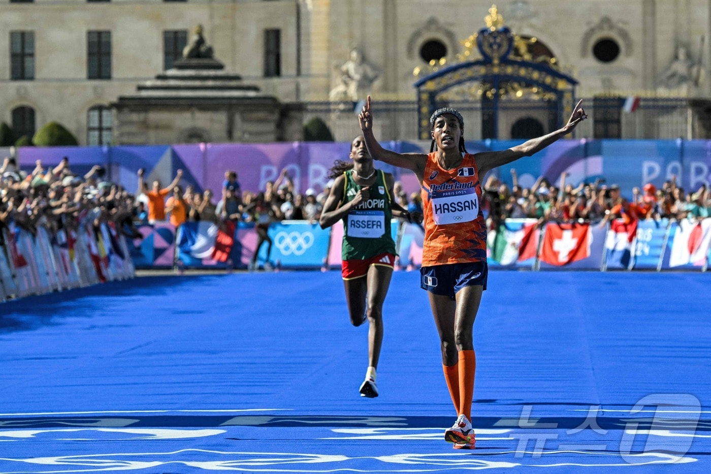'신인류' 하산. 여자 마라톤서 대회 신기록으로 금메달 [올림픽] - 뉴스1
